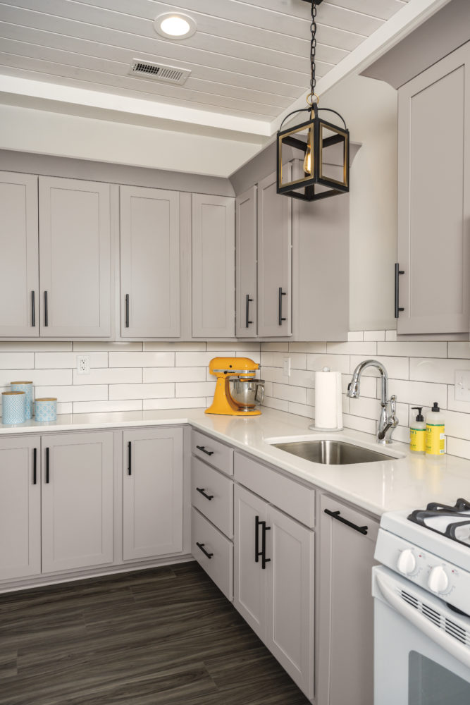 Aristokraft Cabinets Help Transform Garage into Guest House ...